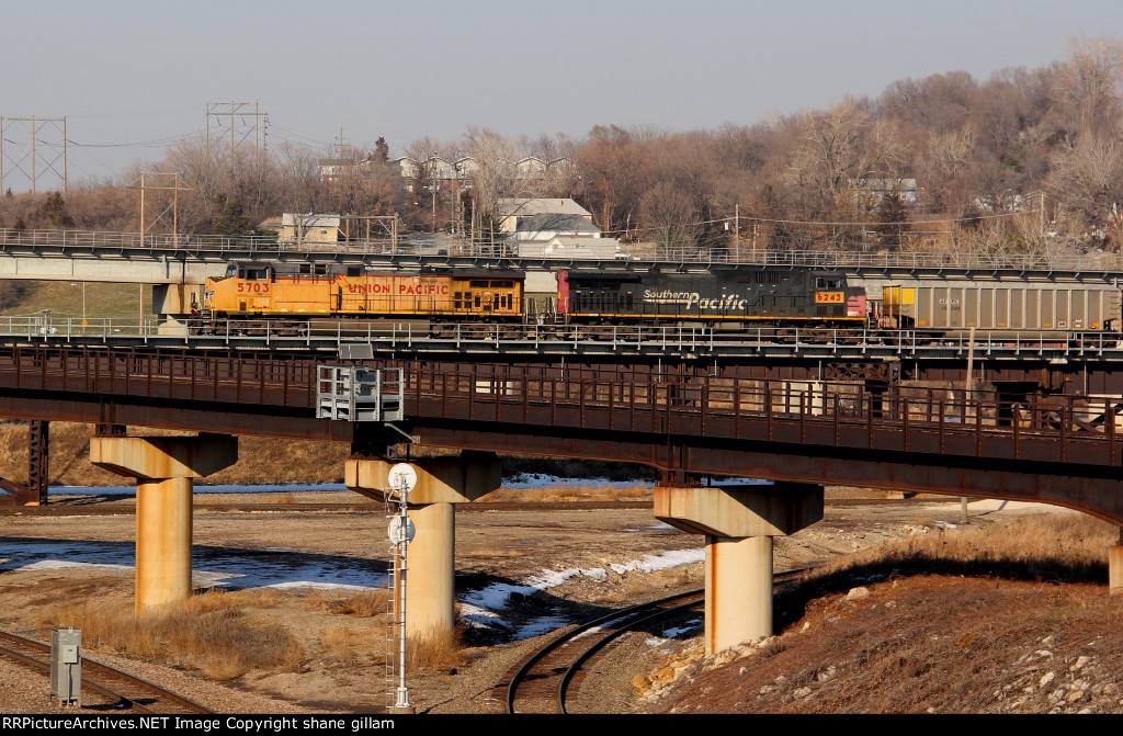 UP 5703 Heads Wb with a empty coal train.